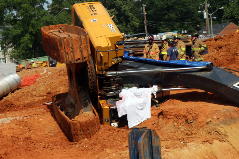 BREAKING: Worker Dies After Excavator Tips Over | ARLnow.com